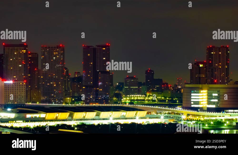 A dawn timelapse at the urban city street in Ariake Tokyo high angle ...