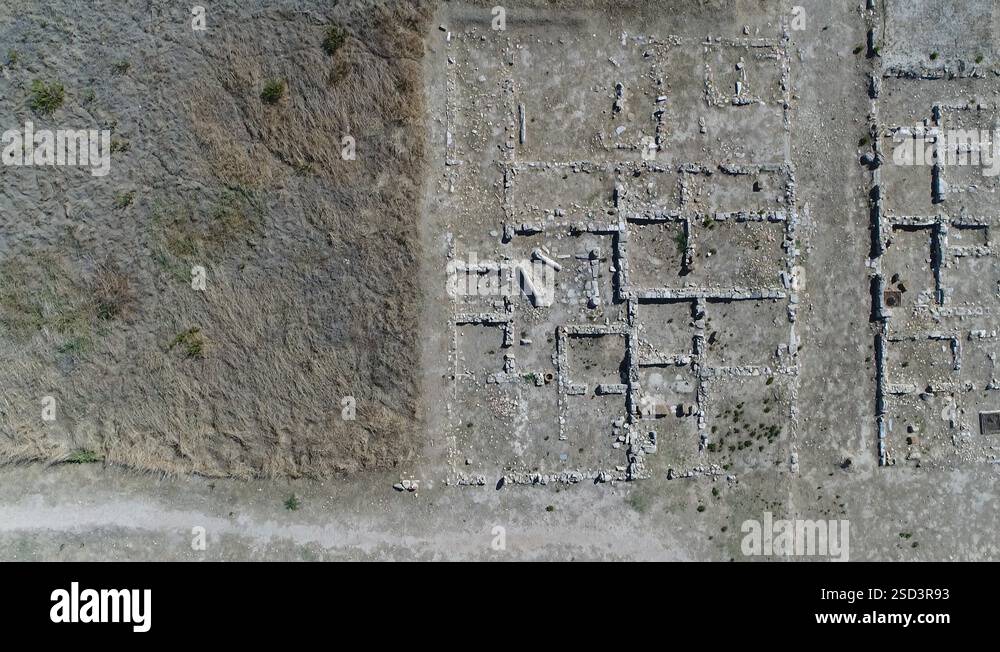Aerial top down view flight over ancient human settlement ruins 4k ...