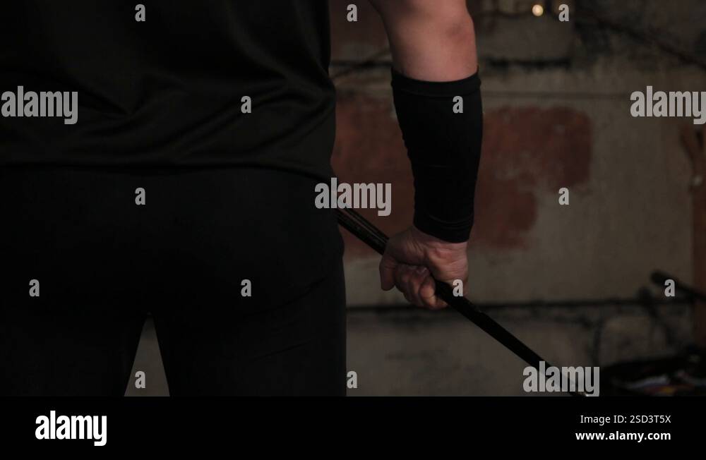 Strong hand of a man with arrows for a bow Stock Video Footage - Alamy