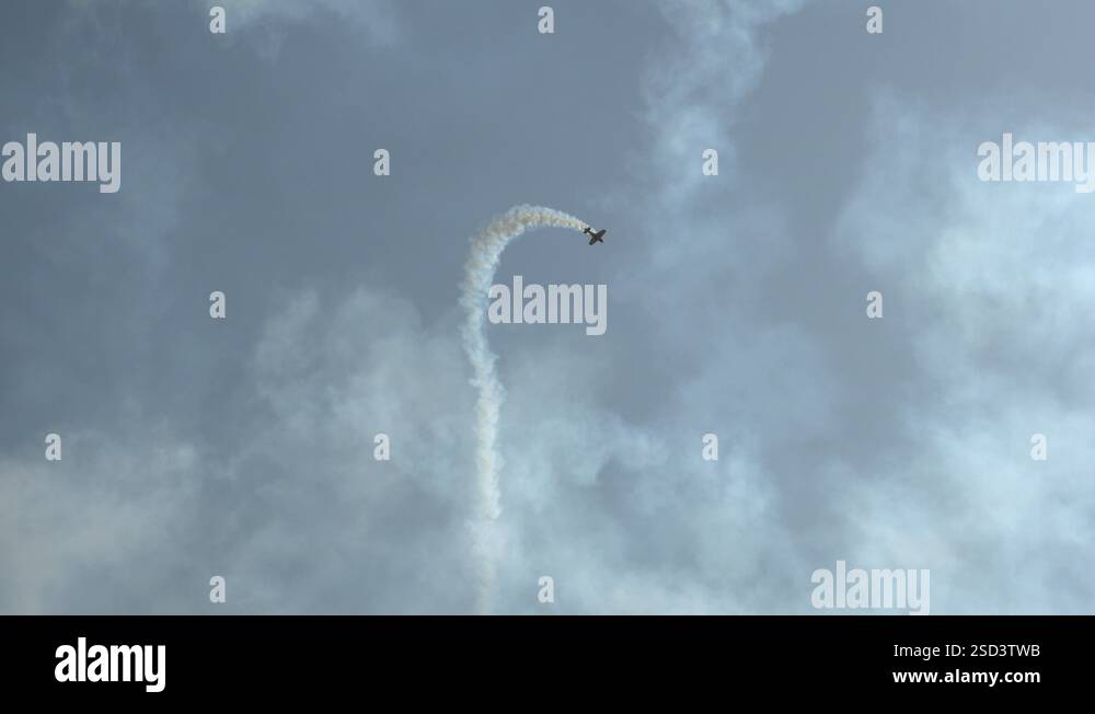 aircraft performs aerobatics flies up makes loop turn aligns trajectory ...