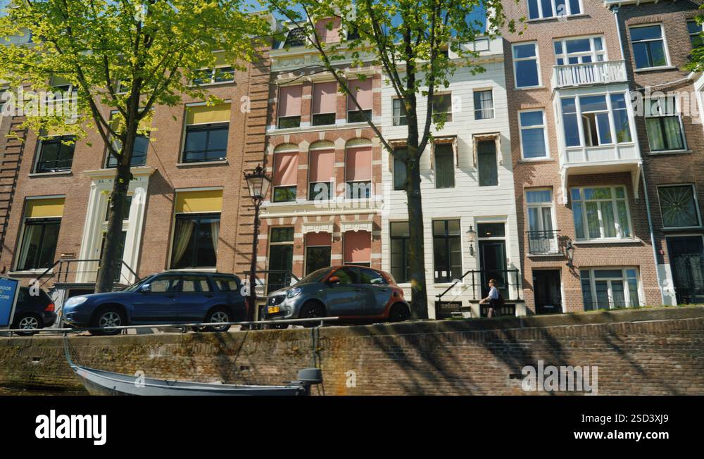 Amesterdam, Netherlands, May 2018: View from a cruise boat to the old ...