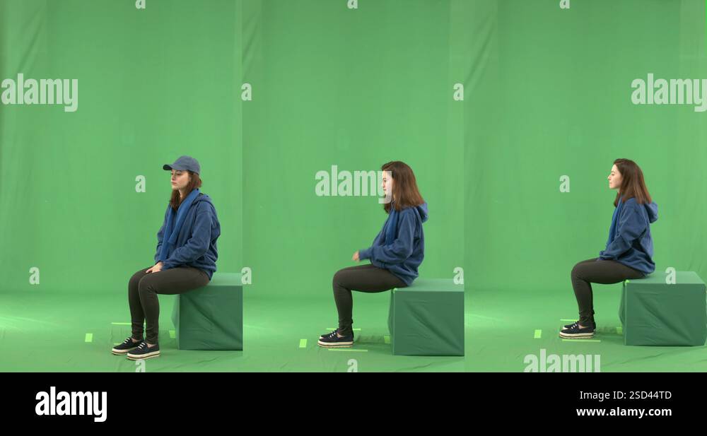 GREEN SCREEN Caucasian female pretending that she is attending a sports ...
