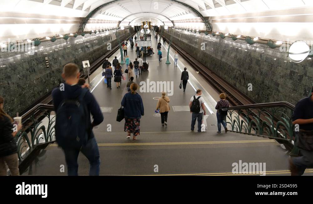 Passengers rise from the metro hall Slavyansky Boulevard. People go up and down Stock Video ...