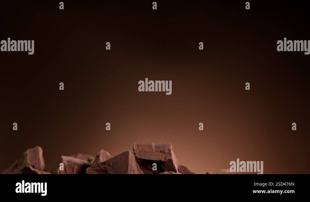 Super Slow Motion Shot of Raw Chocolate Chunks after Being Exploded at ...