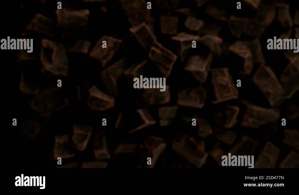 Super Slow Motion Shot of Raw Chocolate Chunks after Being Exploded ...