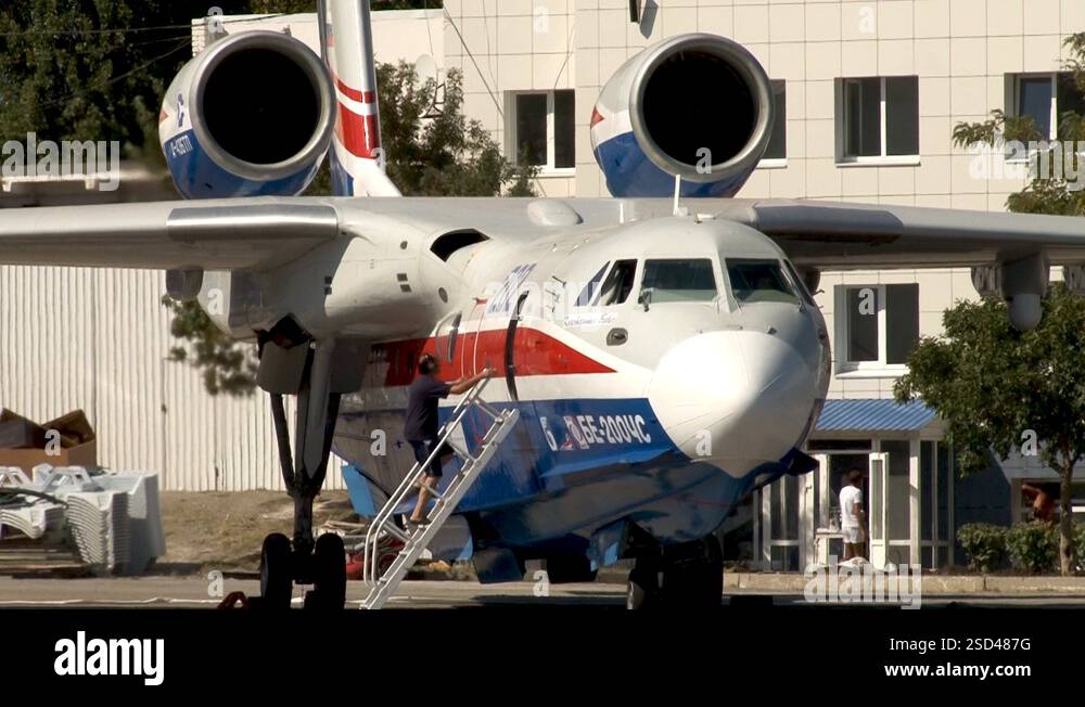 Be-200ES aircraft is parked with running engines before driving. Close ...