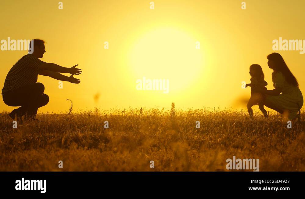 parents play with their little daughter. mother and Dad play with their ...