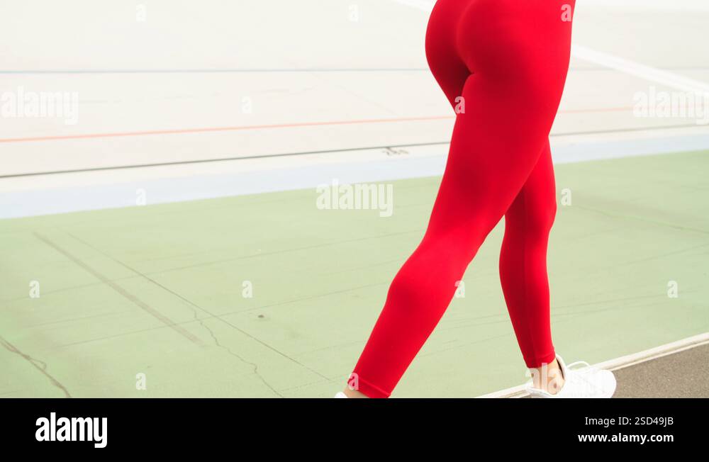 Sport woman legs running at stadium. Fitness girl training buttocks ...