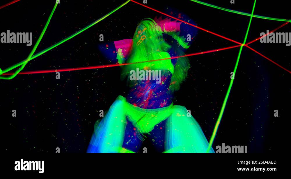 Psychedelic effect on the footage of a young dancer glowing and dancing ...