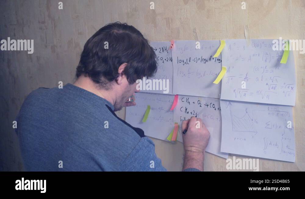 researcher works with various information on paper Stock Video Footage ...