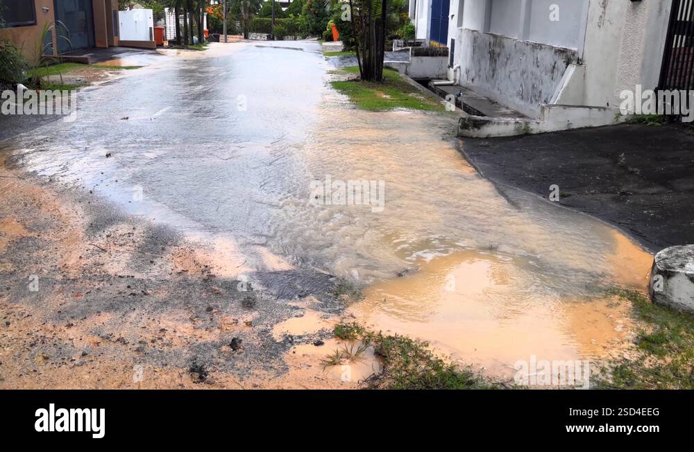 under ground pipe burst cause the muddy water flooded Stock Video ...
