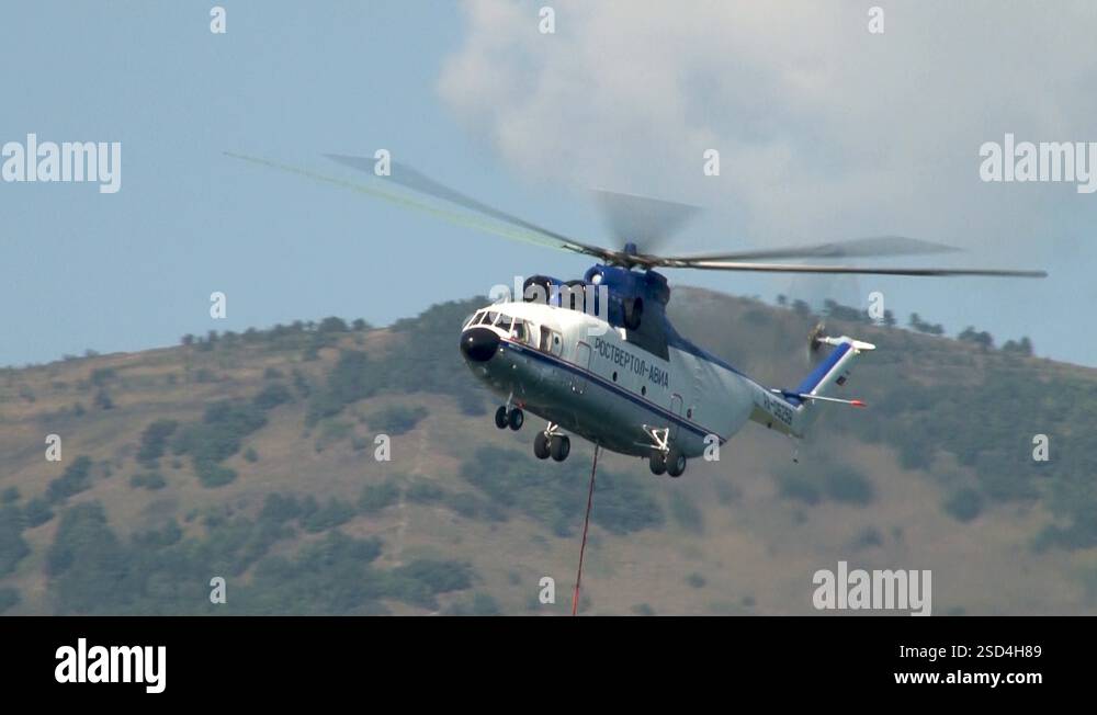 Mi-26T helicopter (Halo) with VSU-15A spillway device flies over of Bay ...