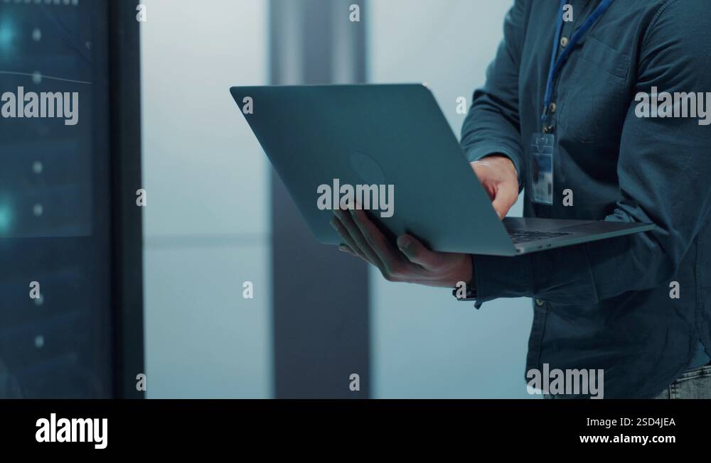 Tech IT administrator doing cloud computing on working server with ...