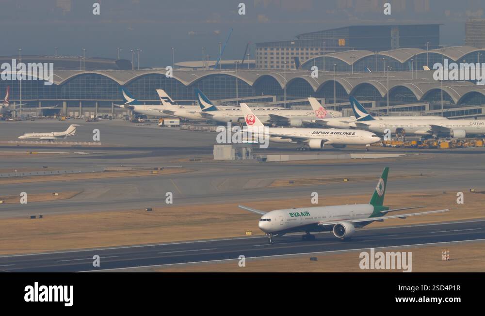 EVA Air Boeing 777 departure from Hong Kong Stock Video Footage - Alamy