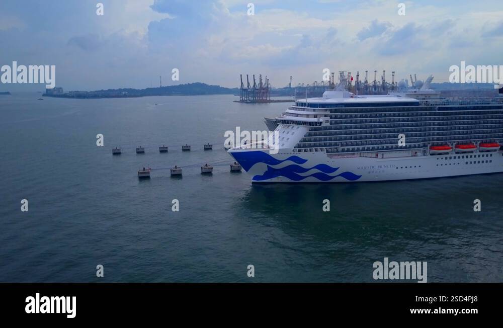 Camera push back to reveal the beautiful Cruise ship in Singapore ...