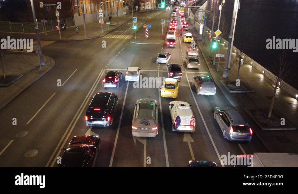 Evening city traffic at rush hour. City traffic jam at the intersection ...