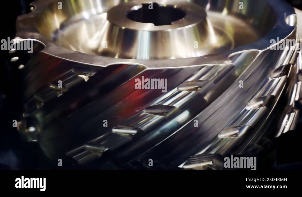 large shiny metal gear rotates slowly Stock Video Footage - Alamy