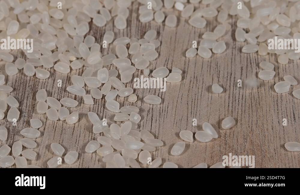 Close up Japanese sushi rice falling on table Stock Video Footage - Alamy