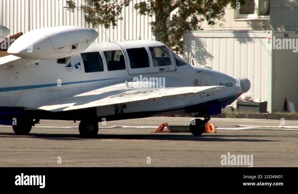 Be-103 amphibious aircraft unfolds in parking lot and stops with ...