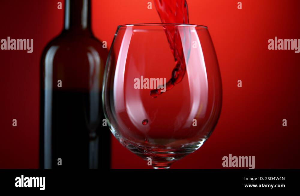 Super Slow Motion Shot of Pouring Red Wine from Bottle with Camera ...