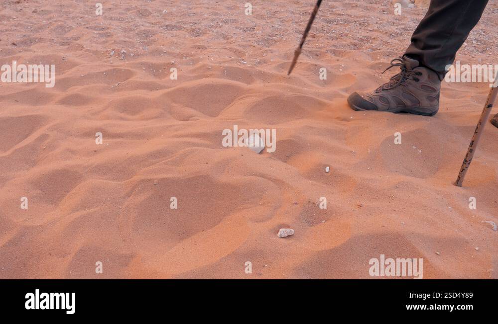Feet In Boots Tired Exhausted Traveler Trudge Through The Dry Sandy ...