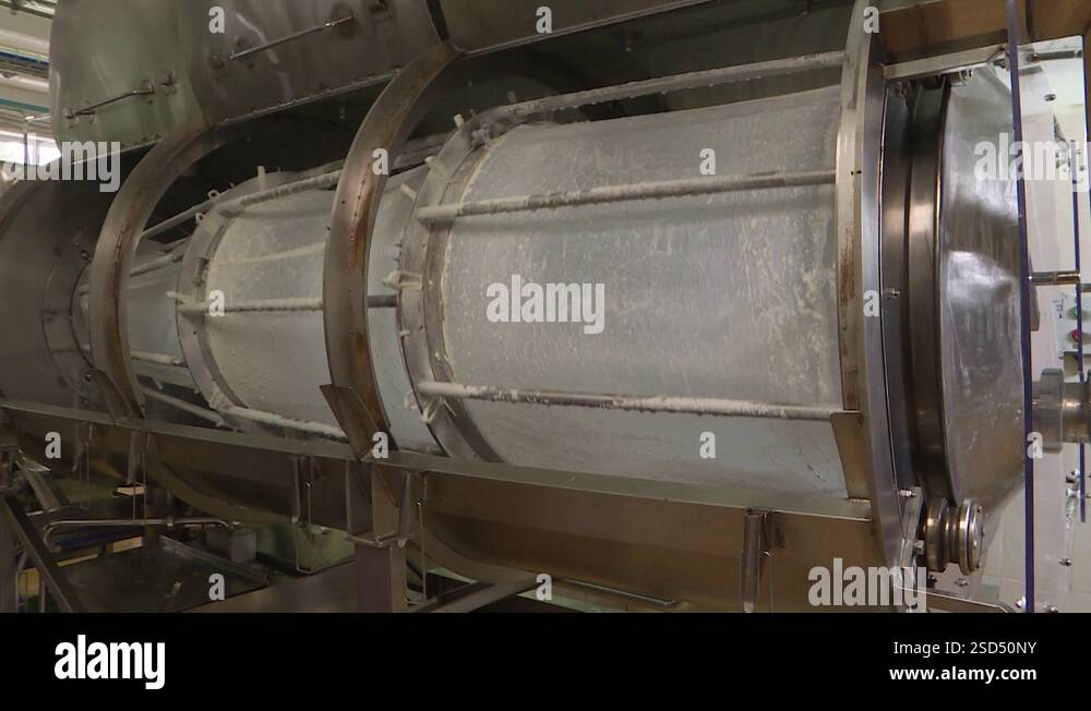 Production of cottage cheese at the factory . Dairy-based cream ...