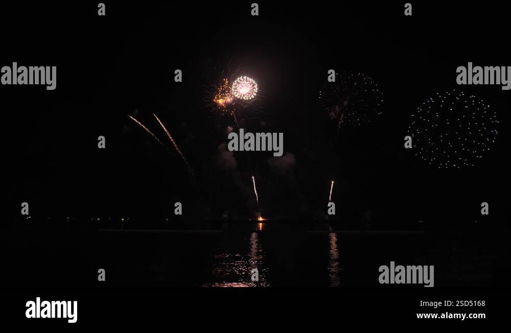 Golden big shiny fireworks with bokeh lights in the night sky Stock ...