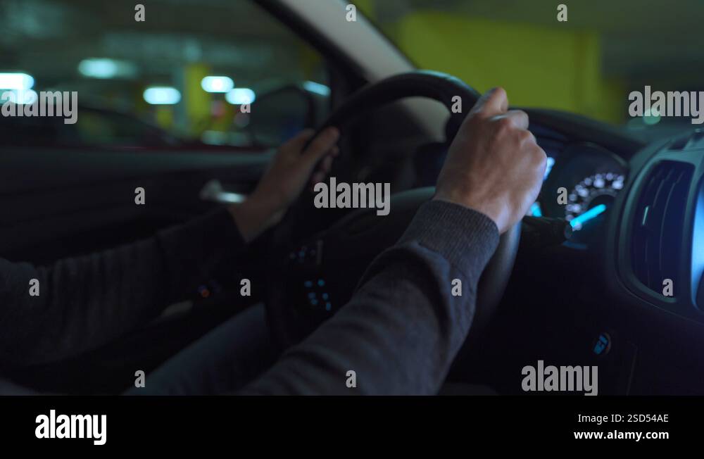 Man driving in innovative automated car using self-parking autopilot ...