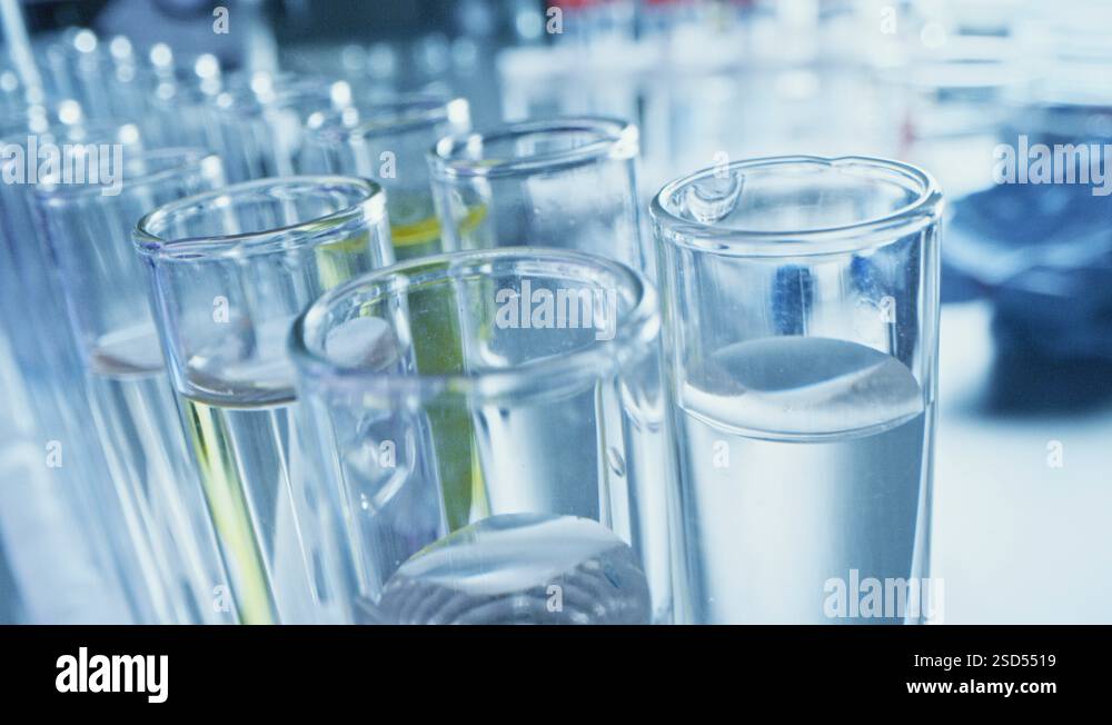Pharmaceutics Laboratory: Multiple Pipettes Dropping Liquids into Test ...