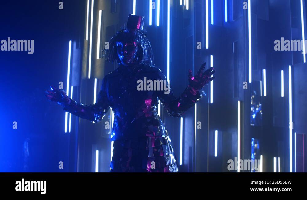A metallic silver woman in shiny costumes is dancing. Metal people ...
