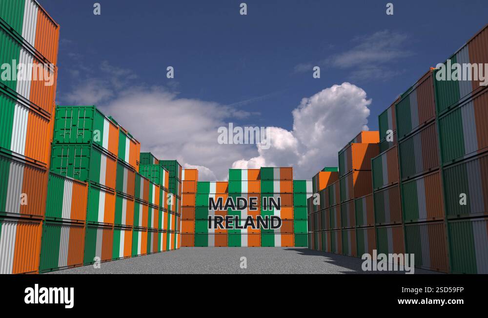 Many cargo containers with MADE IN IRELAND text and national flags ...