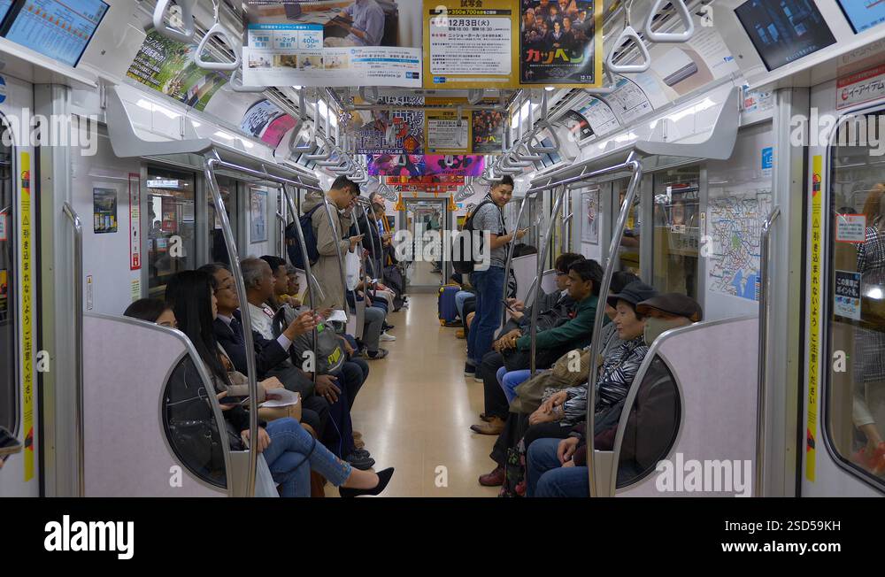 Metro train interior with commuters Tokyo,Japan Stock Video Footage - Alamy