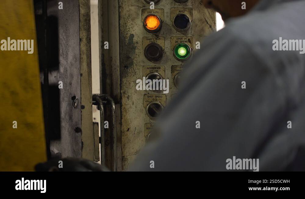 Factory Operator Closing Door Presses Button On Dirty Control Panel ...