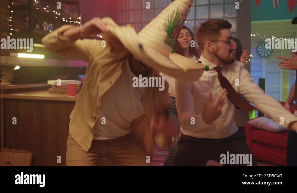 Mexican party. Excited happy young people dancing off partying hard ...