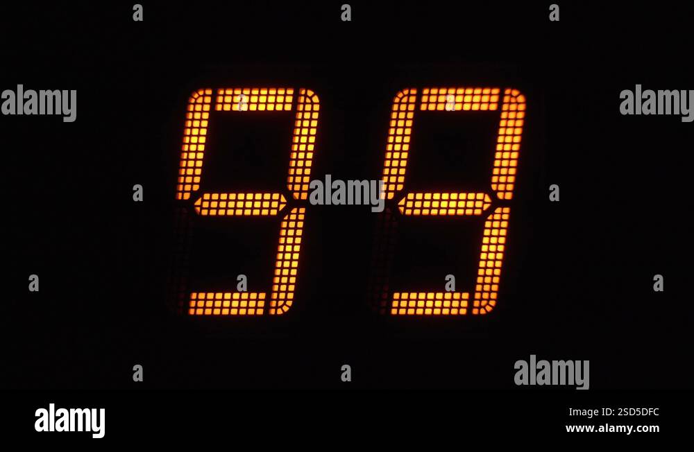 Fast digital countdown in orange numbers on an electronic display from ...