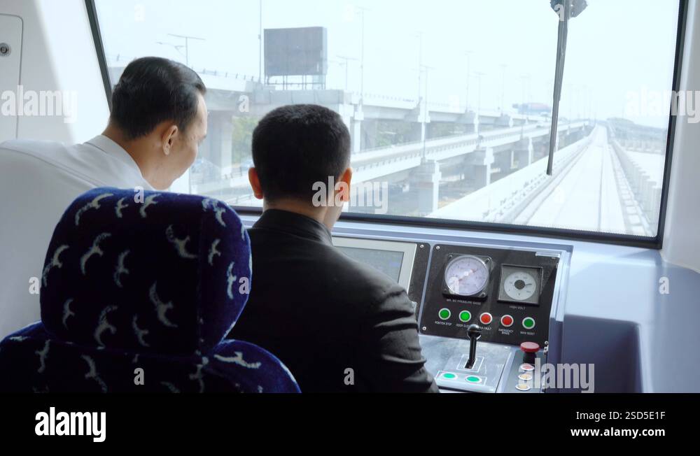 Two drivers riding Soekarno Hatta Airport Skytrain Stock Video Footage ...