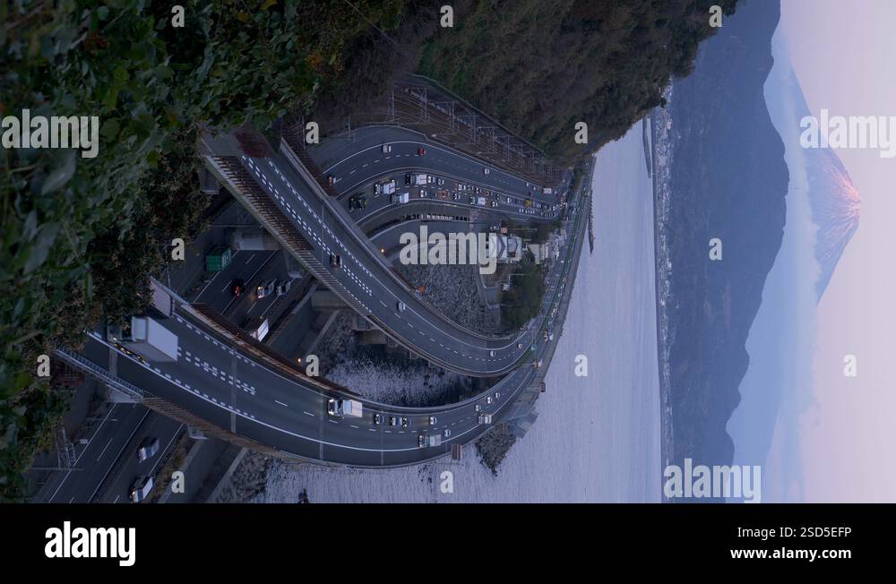 Mt. Fuji over the Tomei Expressway and Suruga Bay (vertical/time lapse ...