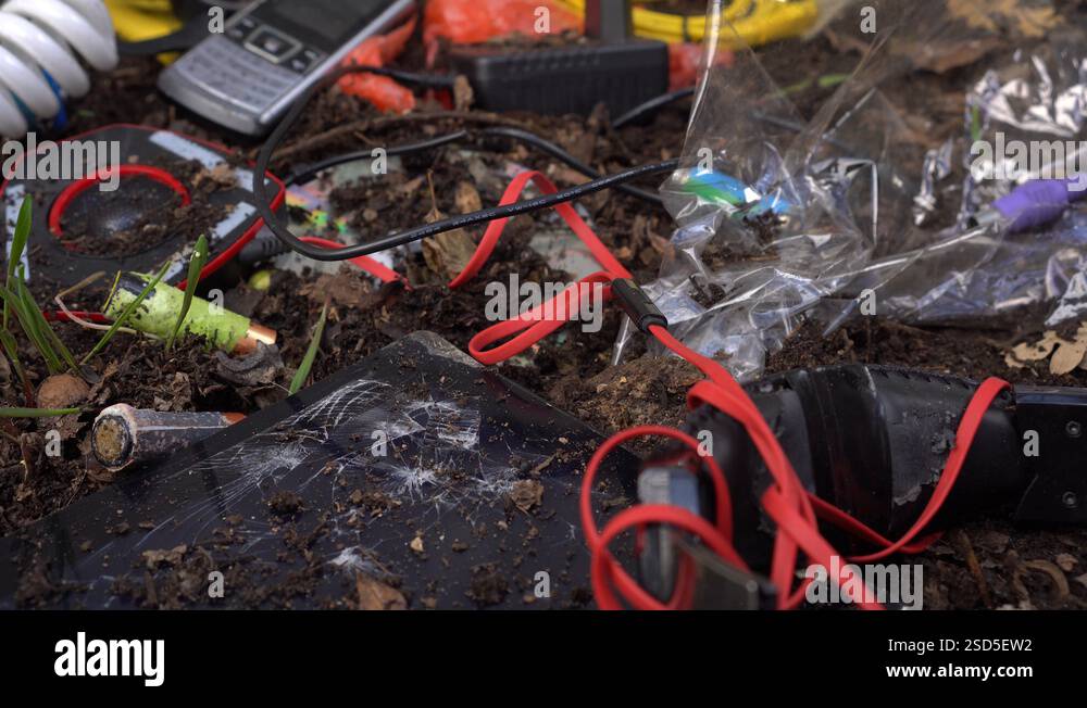 Used electronics in a landfill. Waste Electrical and Electronic ...