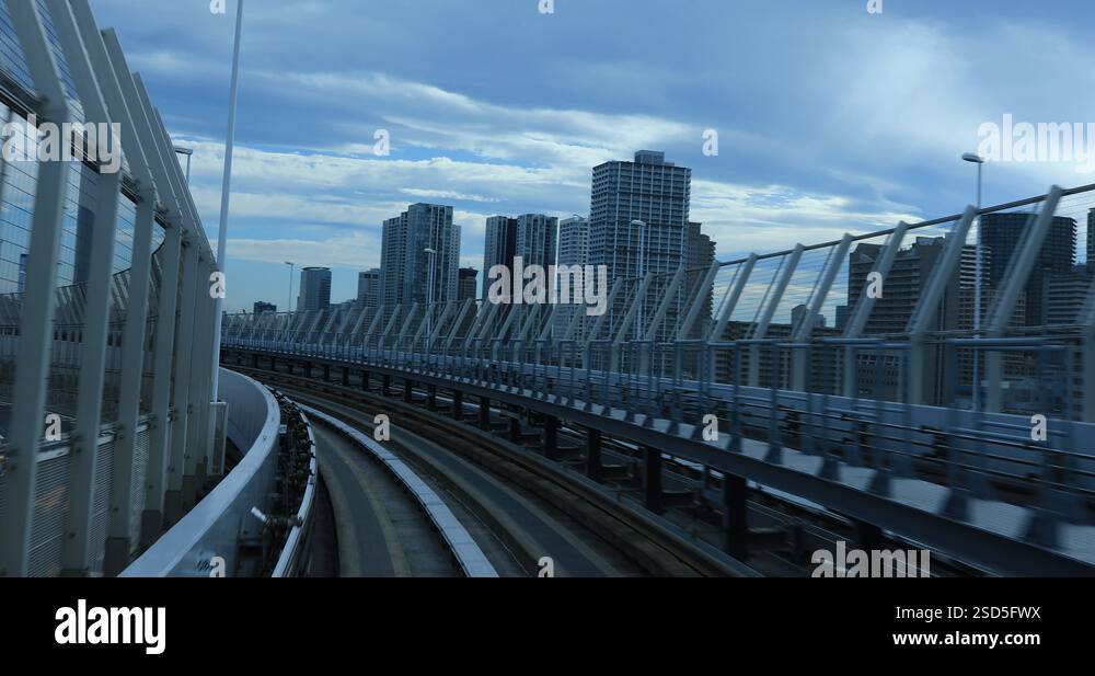 A front point of view on the railway at Yurikamome line in Tokyo Stock ...