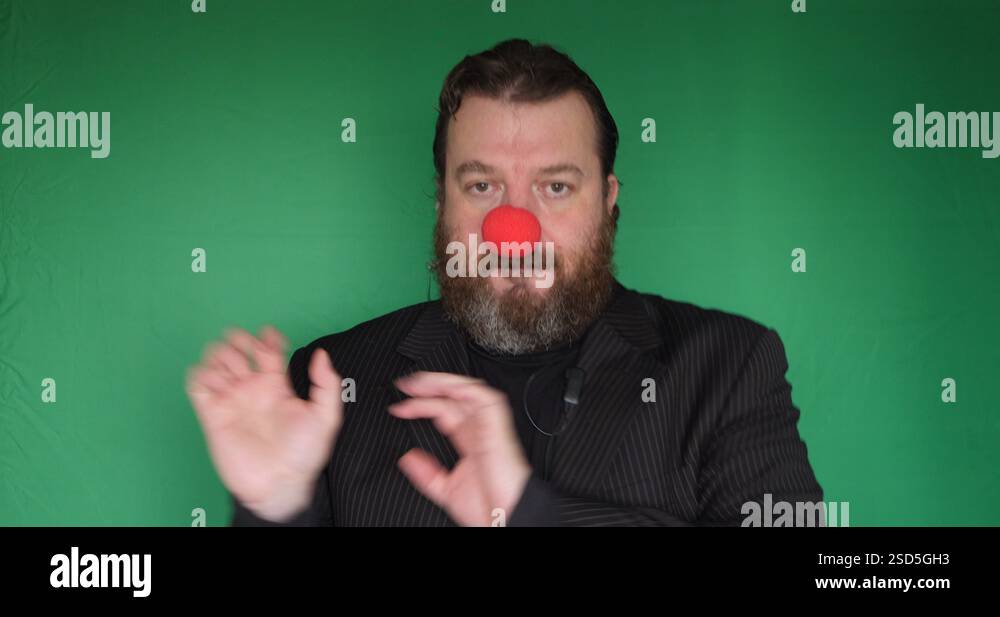 Portrait of dancing bearded security man in front of green screen Stock ...
