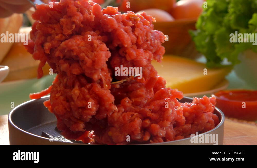 Minced meat is pressed into a beef burger cutlet Stock Video Footage ...