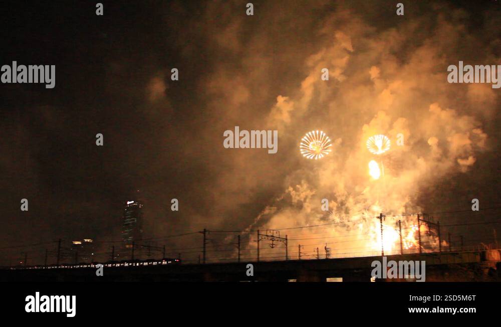Train, fireworks and skyscraper Stock Video Footage - Alamy