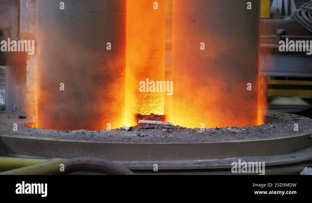 Fire and melted steel from a electric arc furnace Stock Video Footage ...