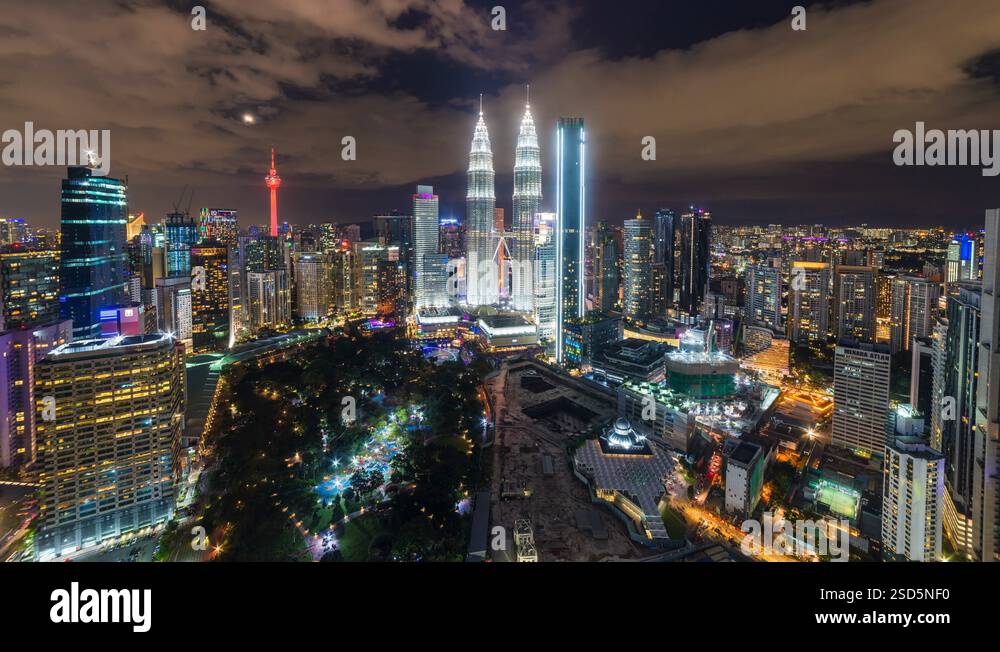 Time Lapse - High angle Night view of Petronas Towers and the city of ...