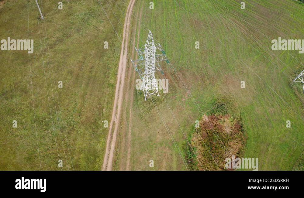 Electricity pylon tower with wires lines on field in country area ...