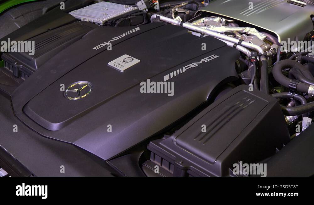 A closeup detail of an engine inside a Mercedes AMG car Stock Video ...