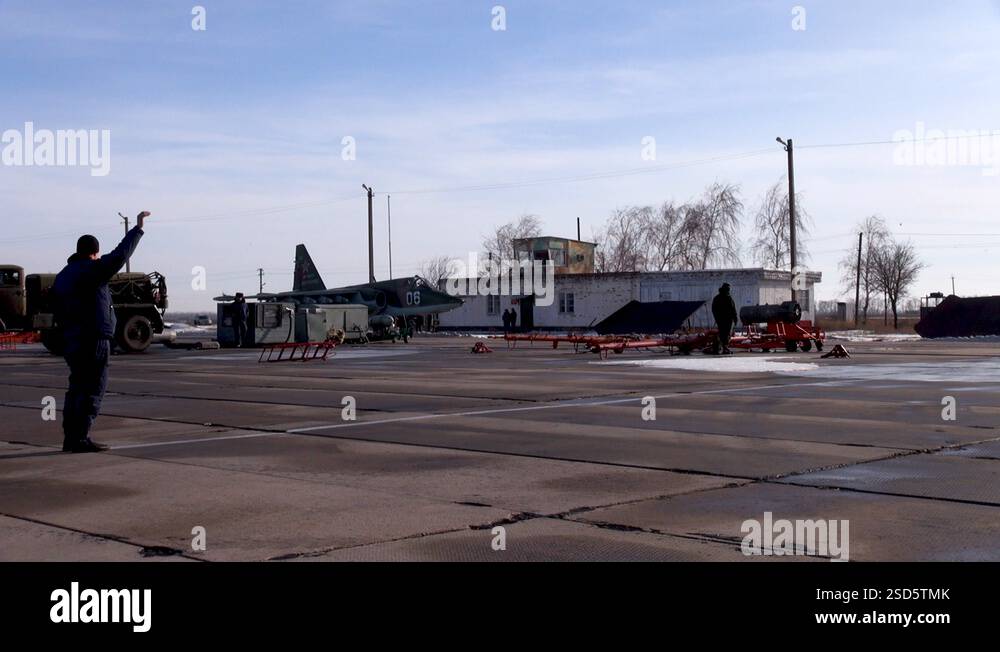 Attack aircraft Su-25SM (Frogfoot) is taxiing to parking lot after ...