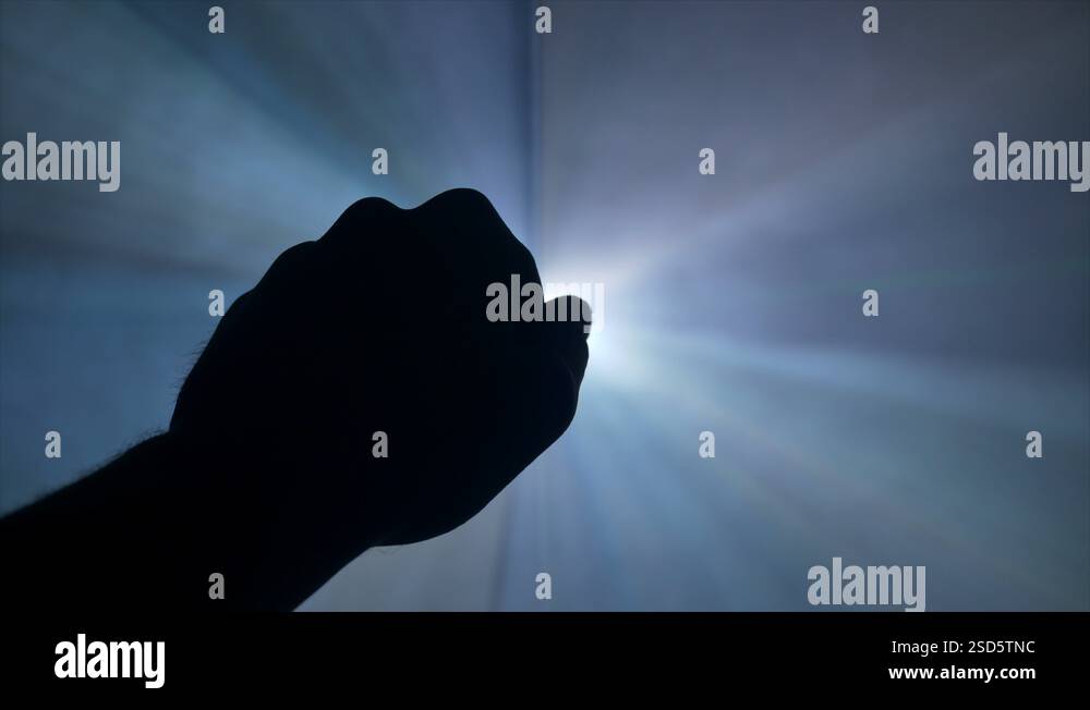 4K Shot Of Hand Reaching Out And Opening Fist Towards Beautiful Rays Of ...