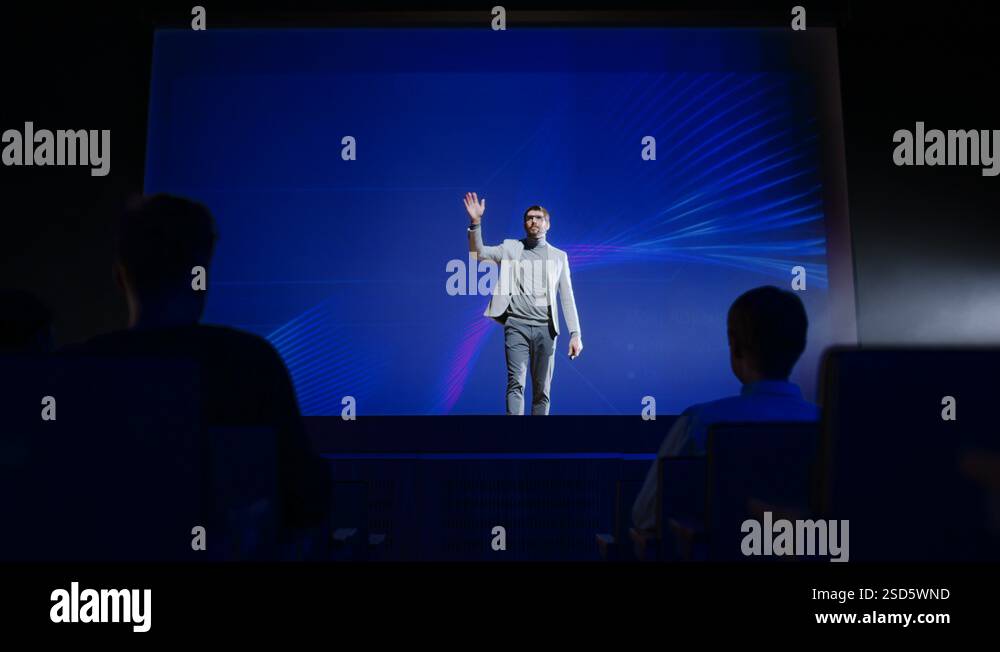 Successful Speaker Walks on Stage and Does New Product Presentation ...