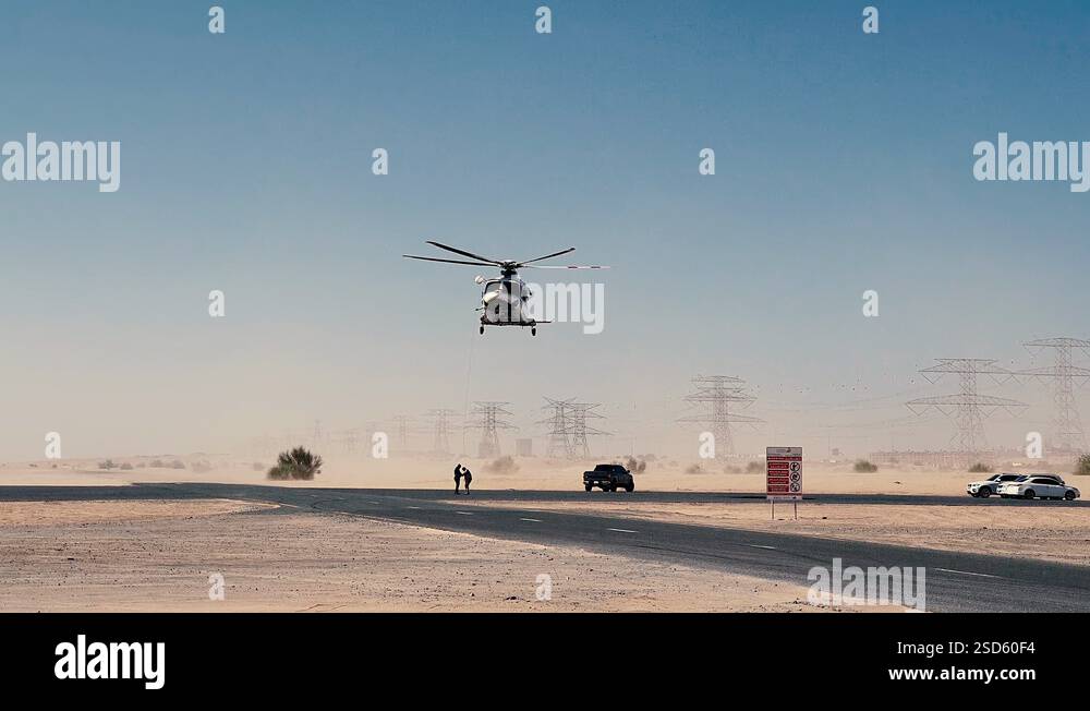 Police helicopter in the desert. Police training and rescue operation ...